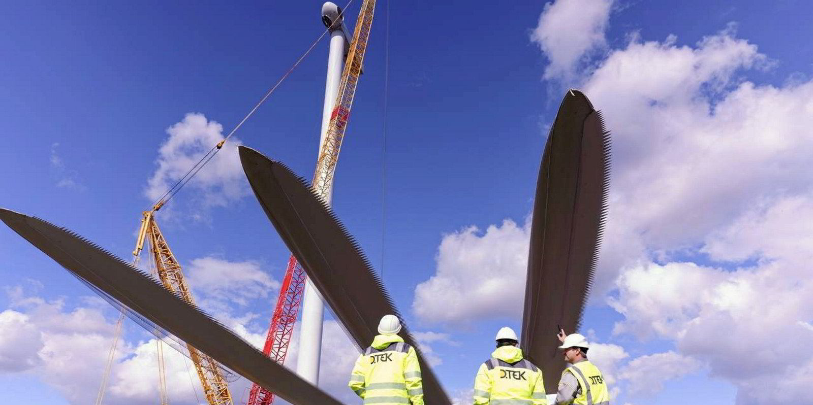 Workers wearing body armour complete wind farm hailed as victory for ...