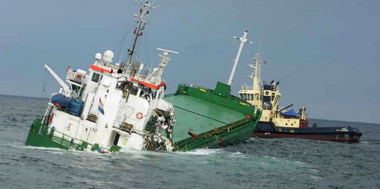 Damaged Erik Thun cargo ship towed to safety after collision off ...