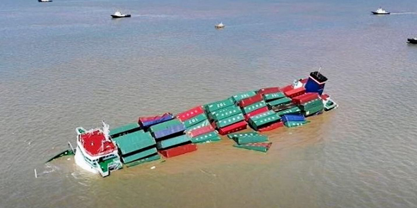 Video: Crew evacuated as container ship partially sunk in collision off ...