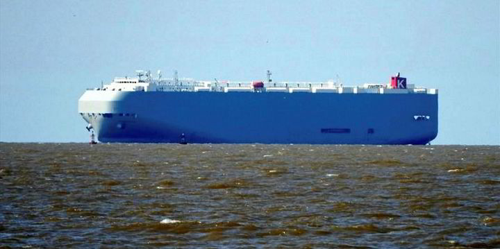 Abandoned K Line car carrier under tow | TradeWinds