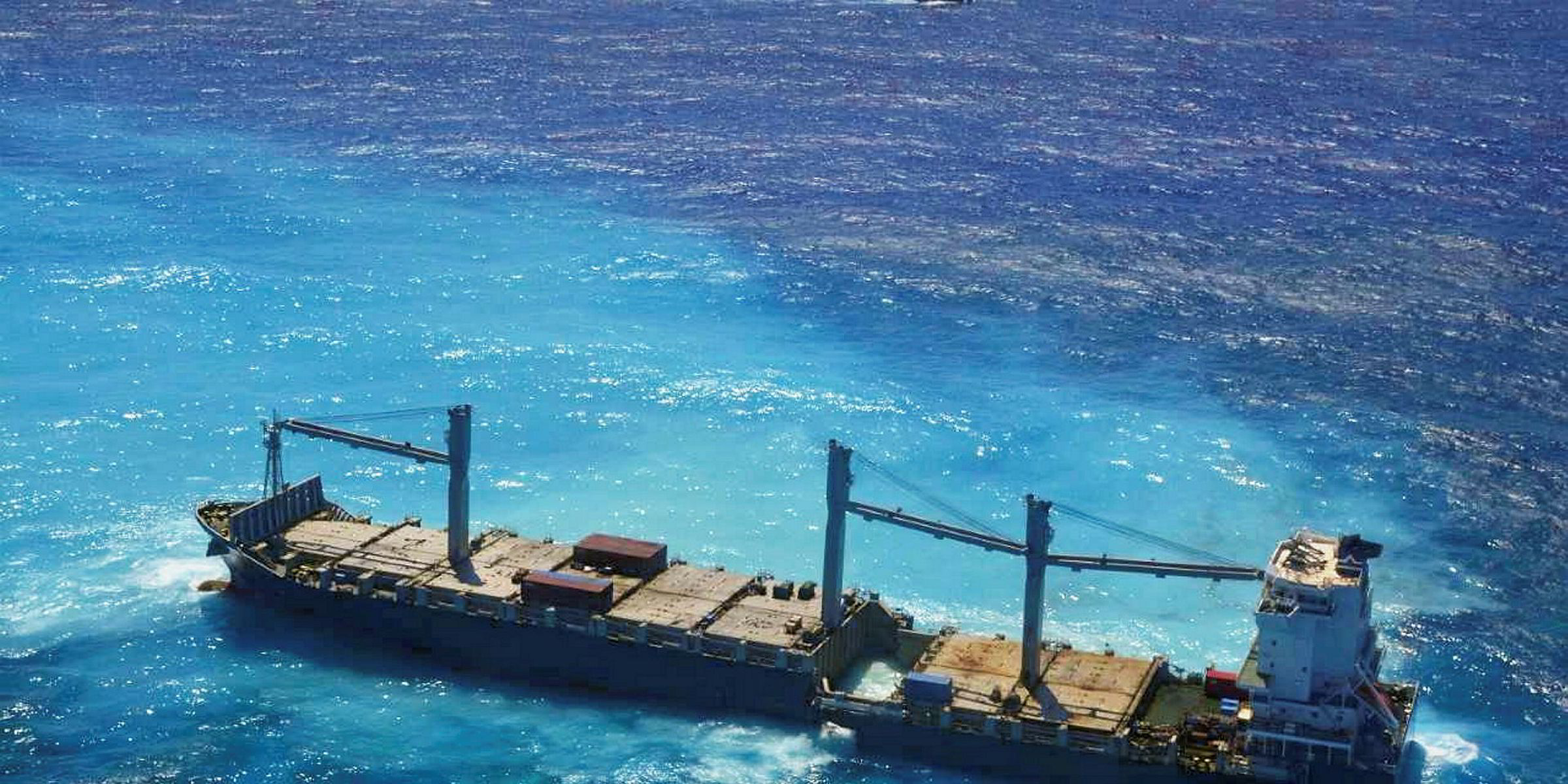 Kea Trader breaks in two on reef | TradeWinds