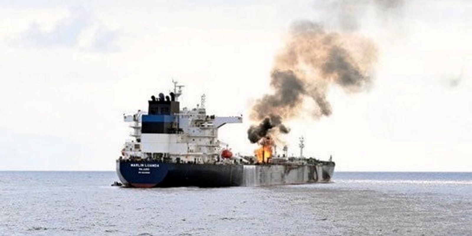 Crew head for lifeboats after US-linked bulker damaged in suspected ...